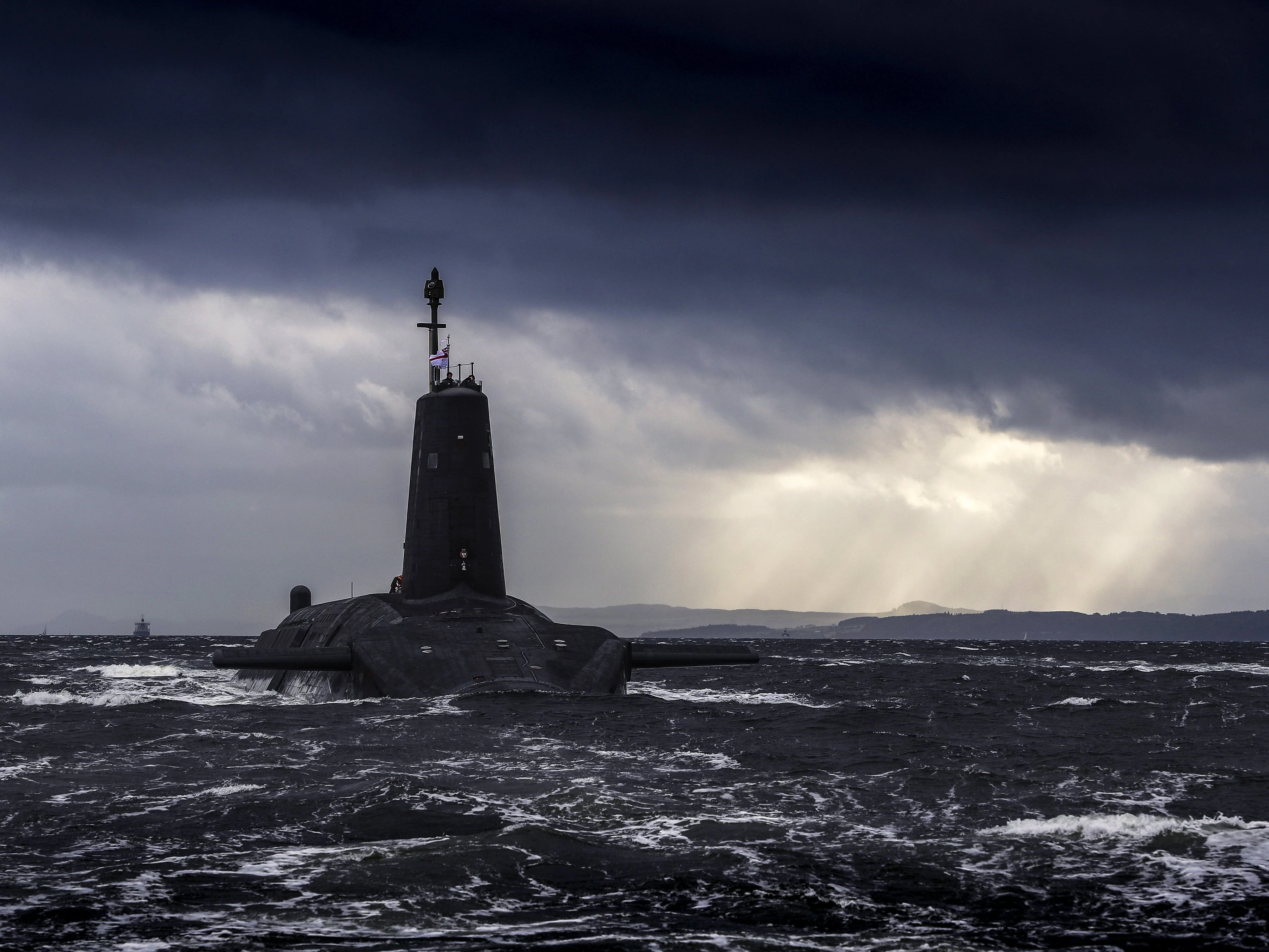 Why are the Royal Navy's nuclear submarines based on the Clyde in Scotland?